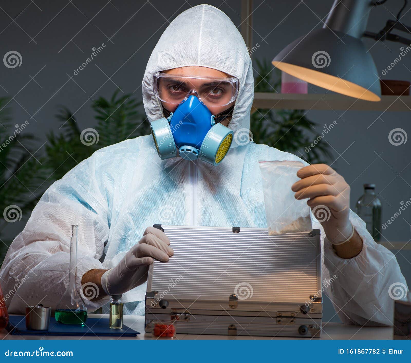 Forensic Investigator Working in Lab Looking for Evidence Stock Photo ...