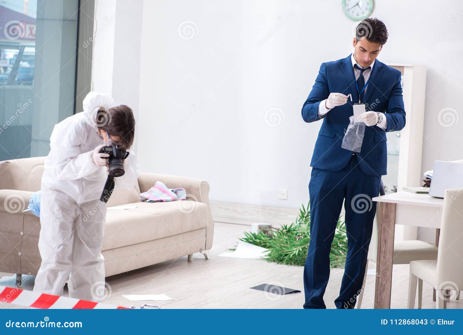 The Forensics Investigator at the Scene of Office Crime Stock Image ...
