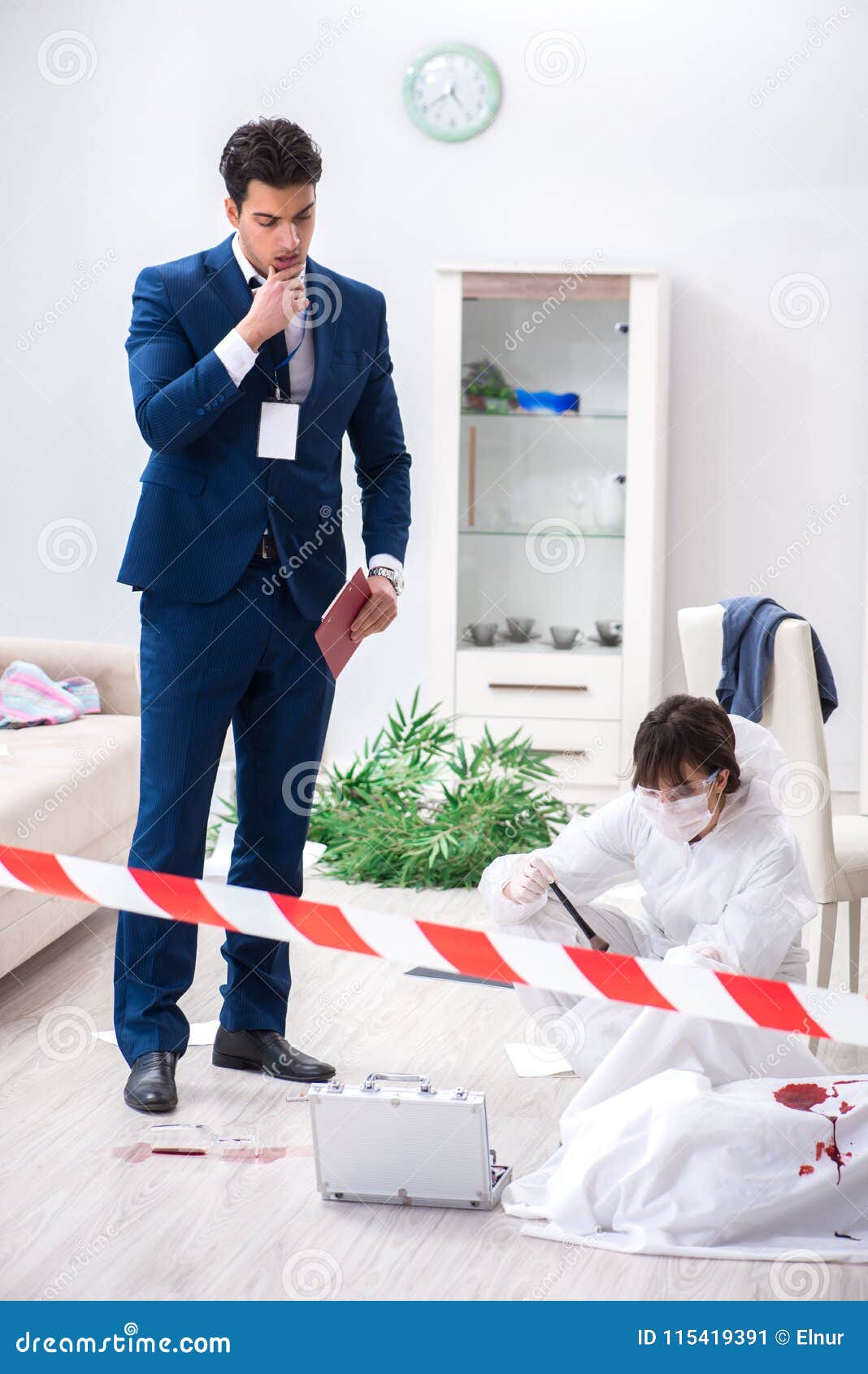The Forensics Investigator at the Scene of Office Crime Stock Image ...