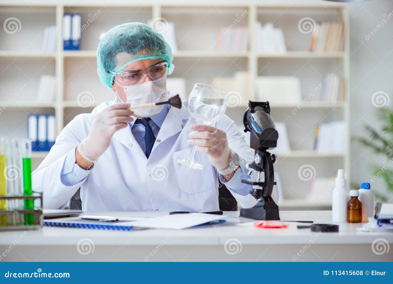 The Forensics Investigator Working in Lab on Crime Evidence Stock Photo ...