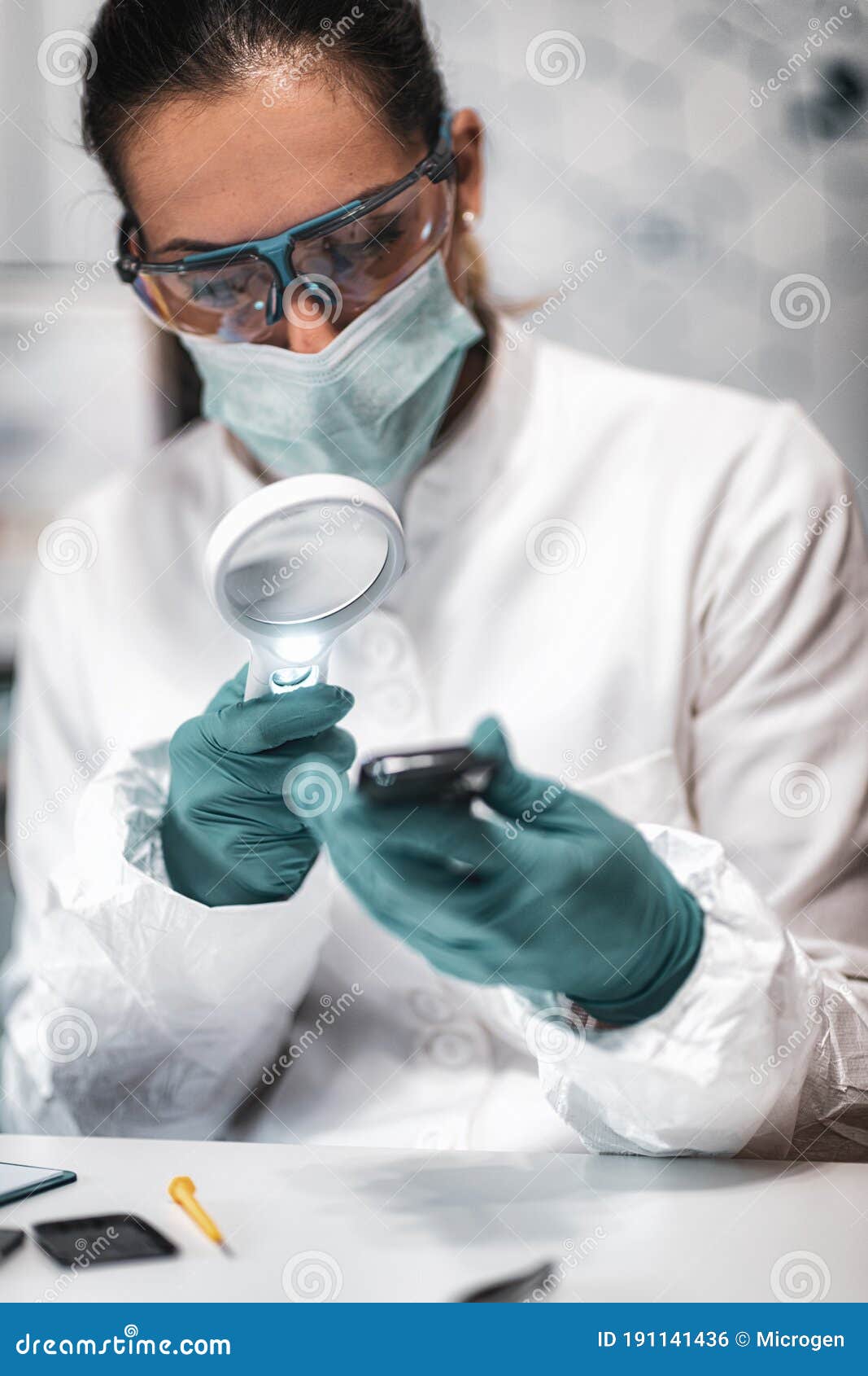 Forensics. Police Expert Examining Confiscated Mobile Phone Stock Photo ...