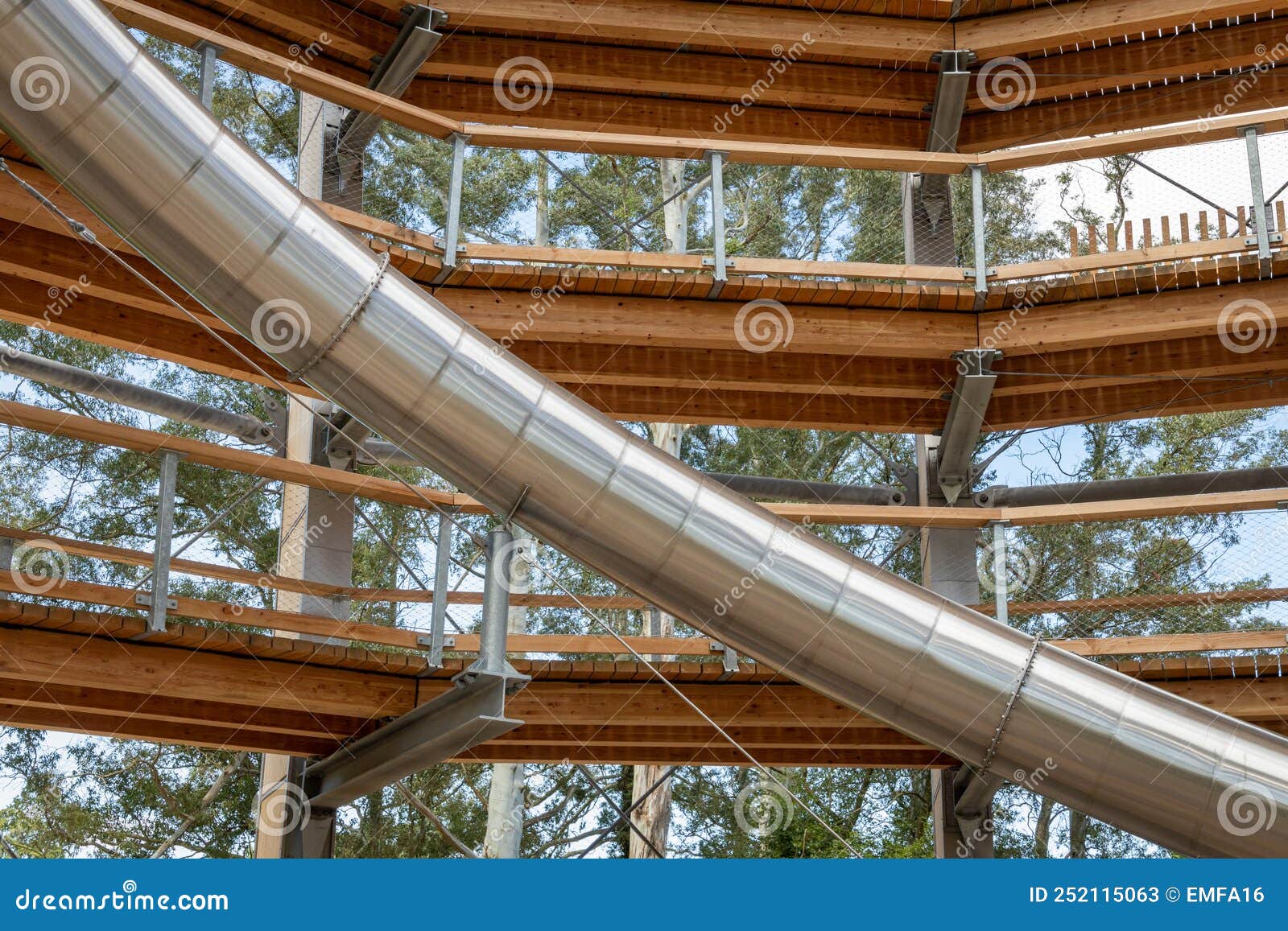 A Forest Walkway Surrounding a Giant Metal Slide Stock Image - Image of ...