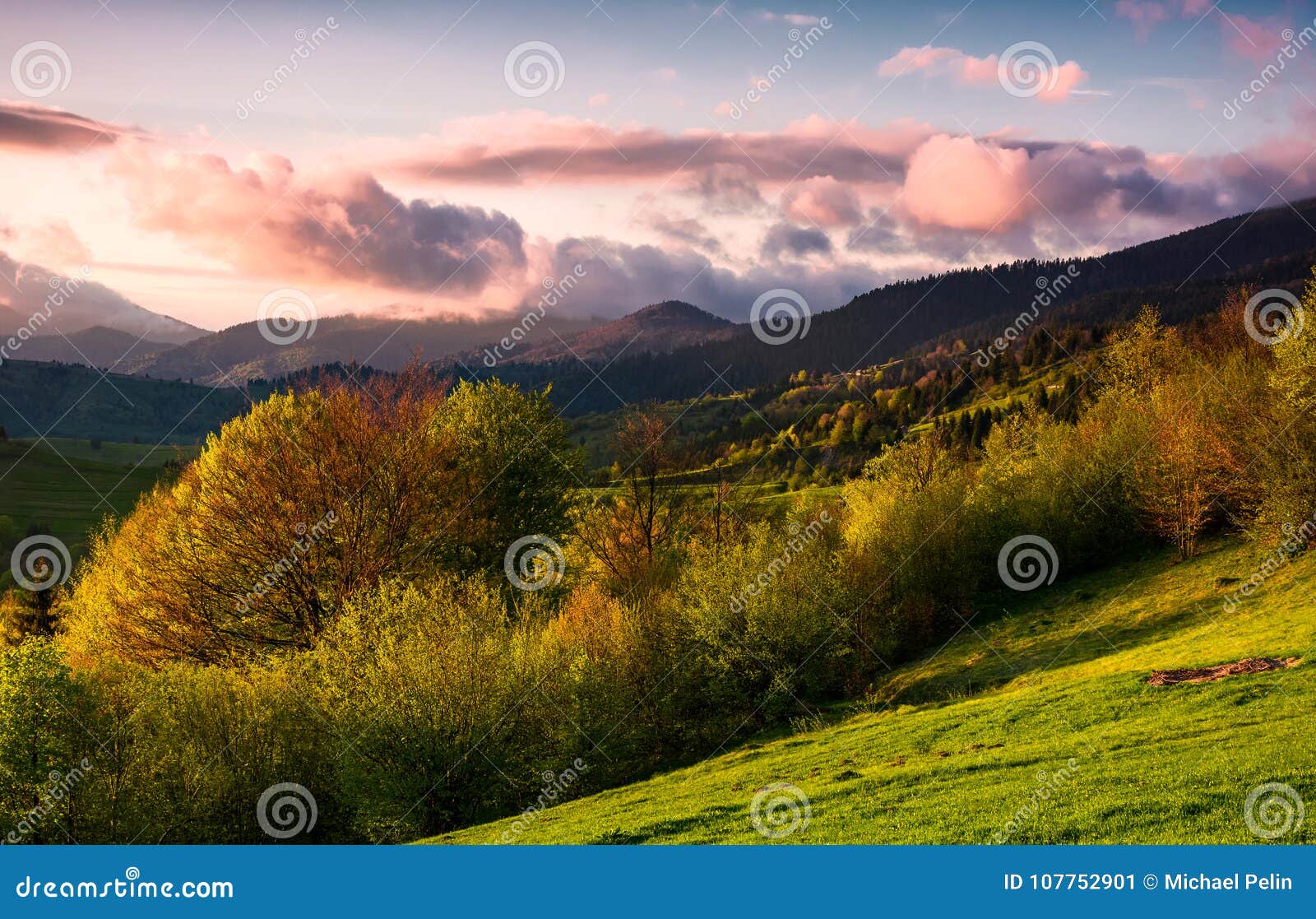 Forested Hill at Cloudy Sunset in Springtime Stock Image - Image of ...