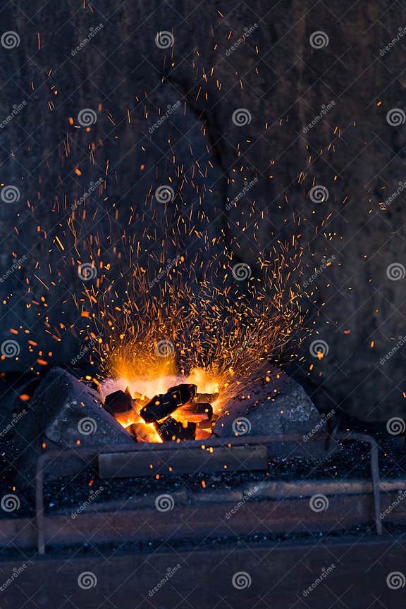 Forge Fire Explosion with Coal and Sparts Stock Image - Image of gories ...