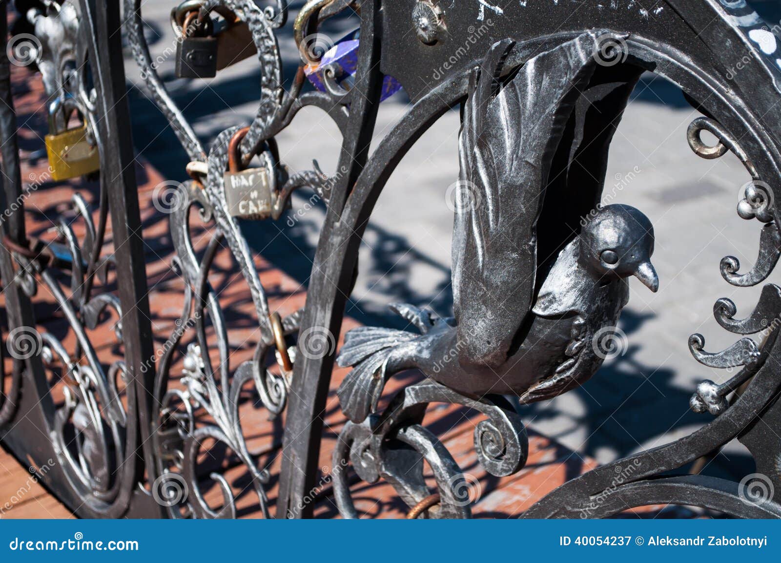 Forged bird on the bench stock image. Image of black - 40054237