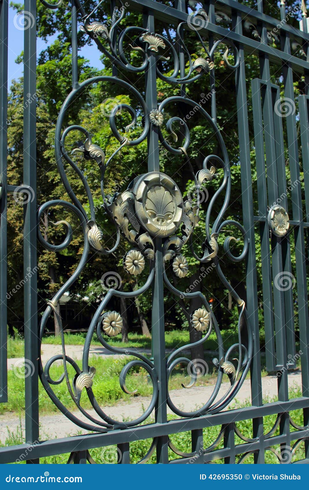 Forged Fence with a Beautiful Ornament Stock Photo - Image of forging ...