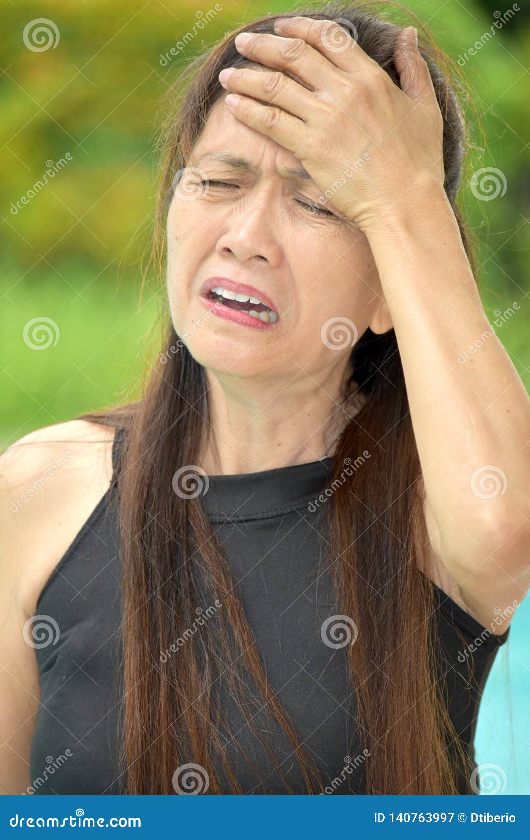 A Forgetful Asian Woman stock image. Image of forget - 140763997