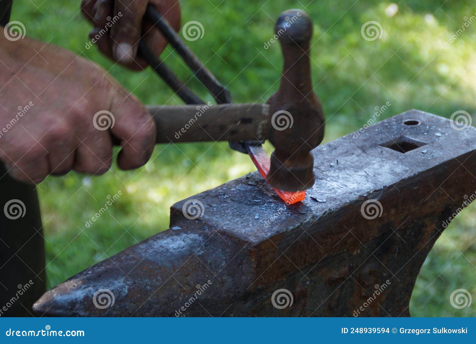 Blacksmithing stock photo. Image of redhot, hammer, heavy - 248939594