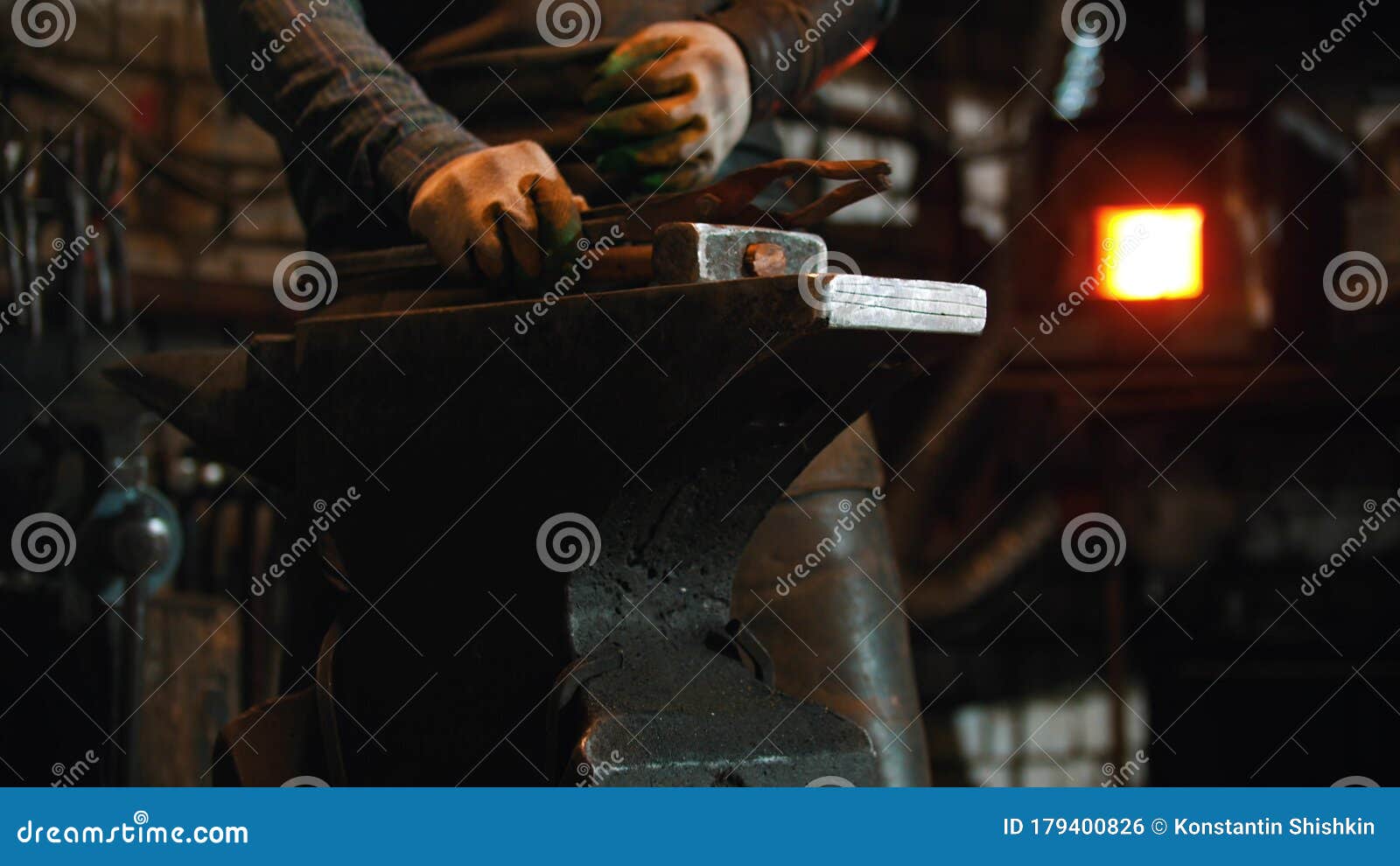Forging Industry - a Blacksmith Putting His Instruments on the Anvil ...