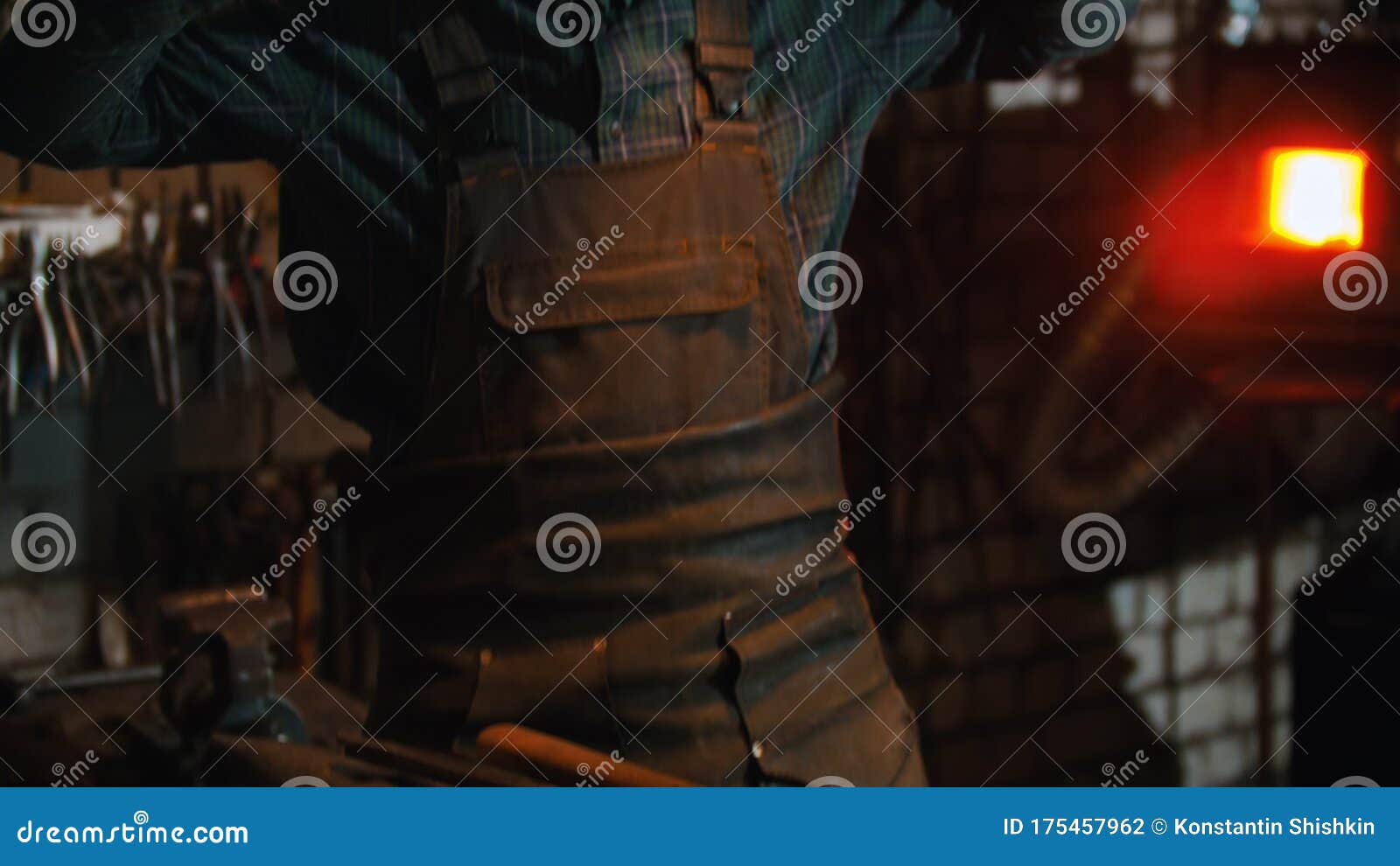 Forging Industry - a Man Blacksmith Putting His Instruments on the ...