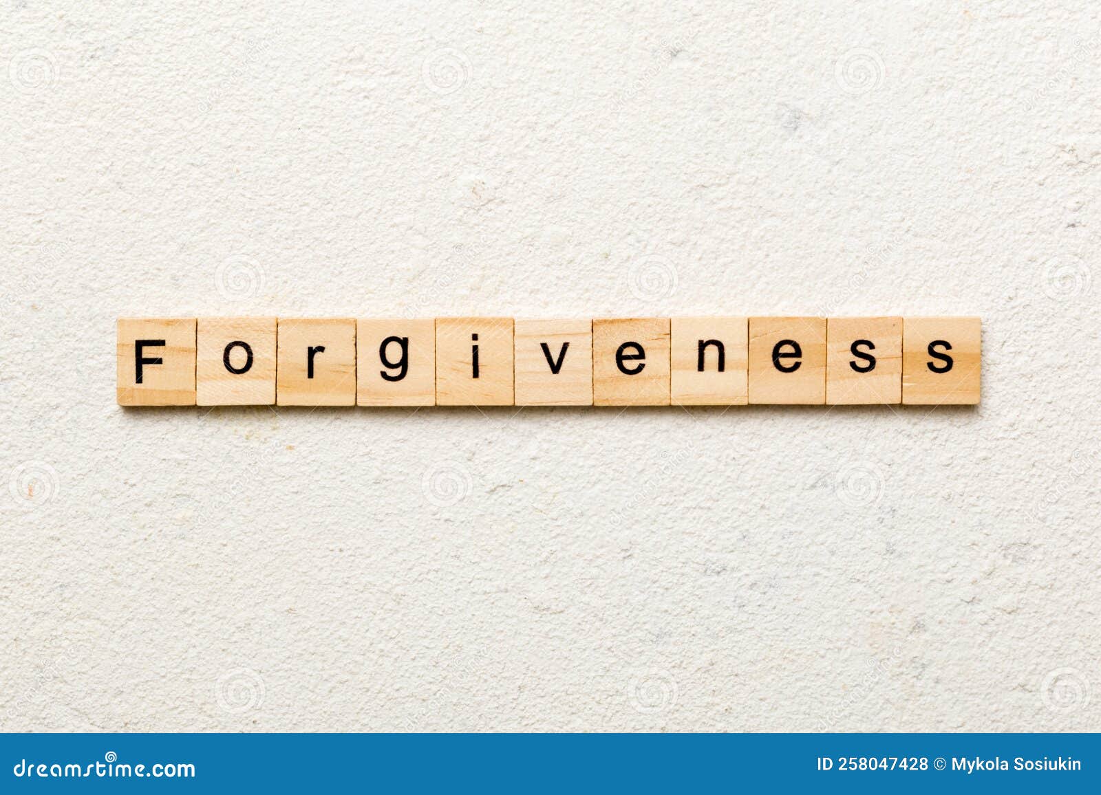 Forgiveness Word Written on Wood Block. Forgiveness Text on Table ...