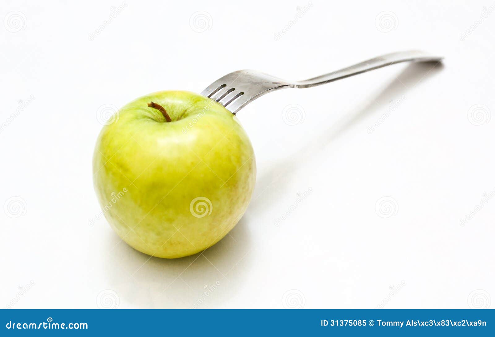 Fork in apple stock image. Image of closeup, vitamin - 31375085