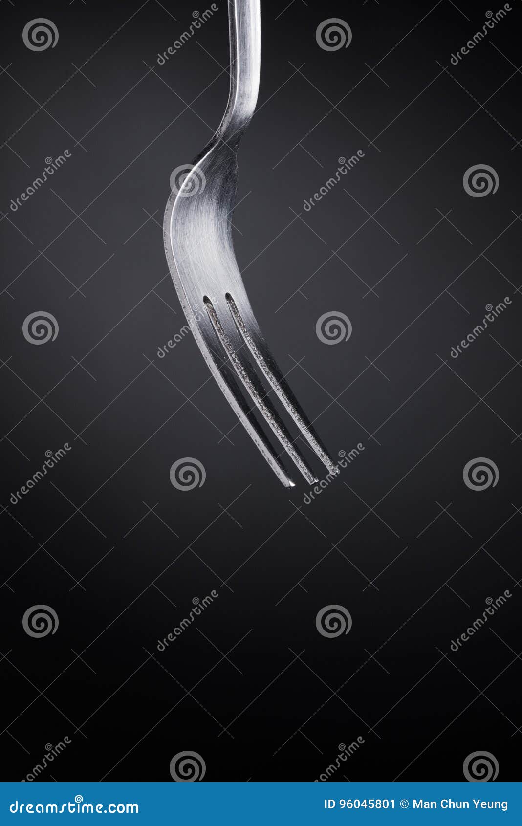 Fork in Black Background: Vertical Stock Image - Image of manufactured ...
