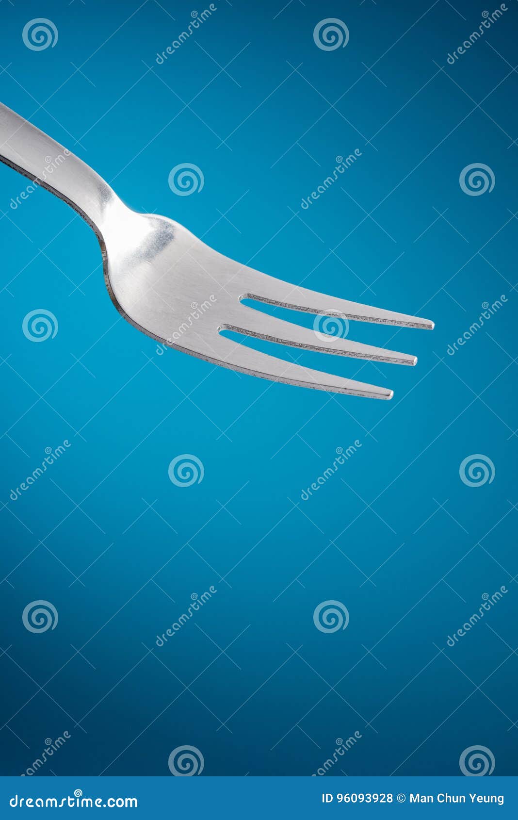 Fork in blue background stock photo. Image of copy, fork - 96093928