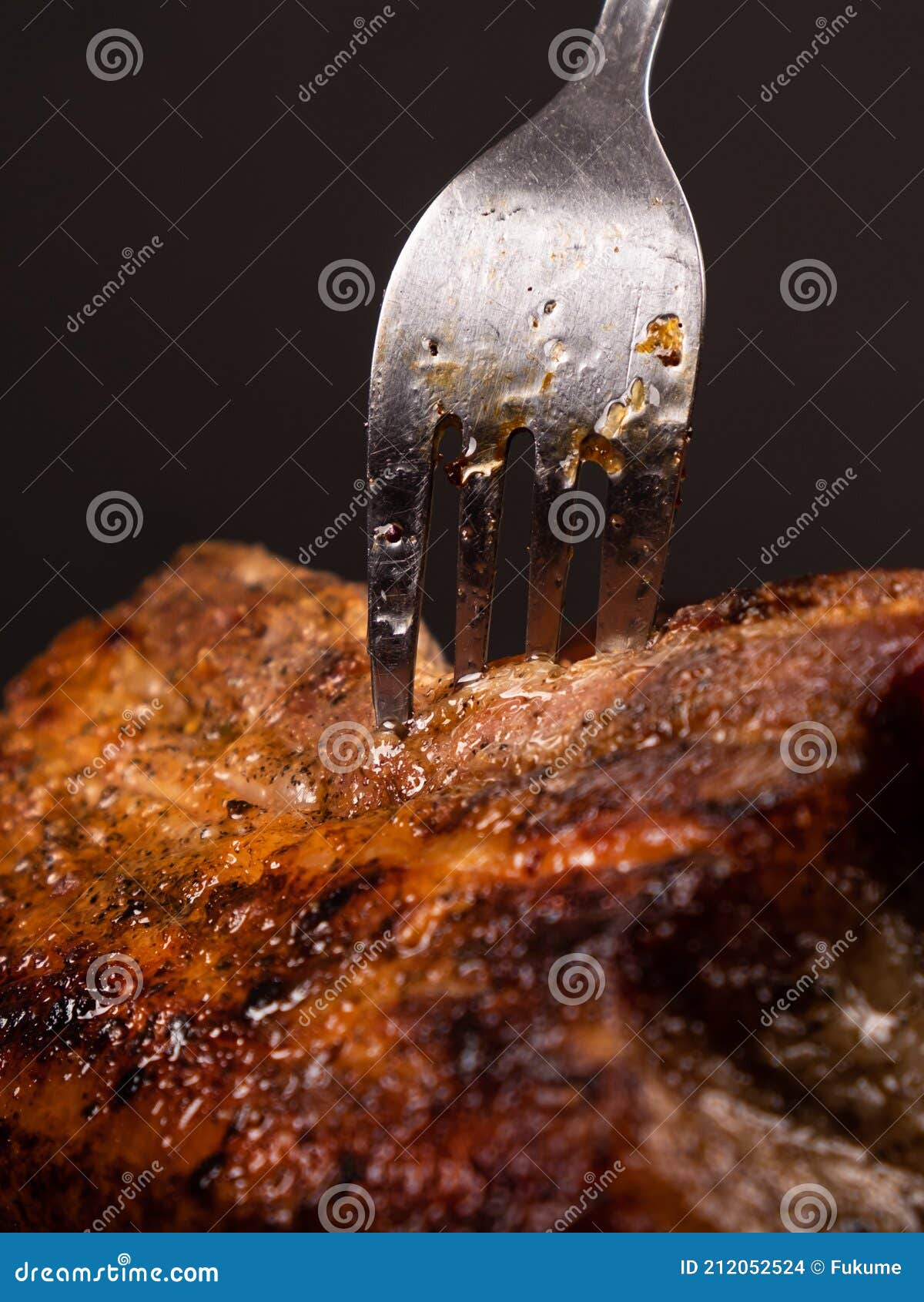 Fried Piece Of Beef Ribeye, Cut Into Pieces On A Brown Wooden Board ...