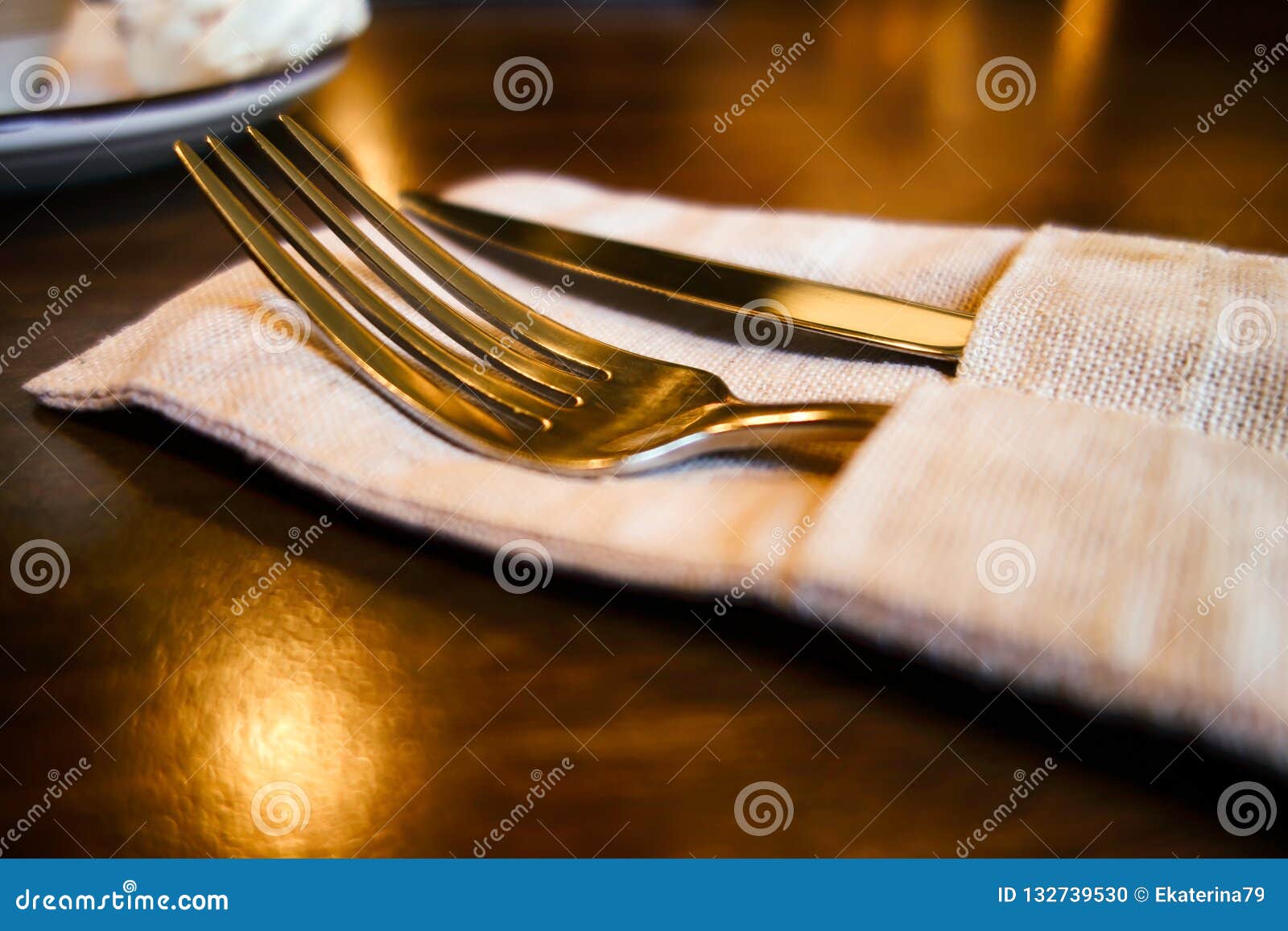 Fork and Knife in Linen Napkin on Table Stock Photo - Image of ...