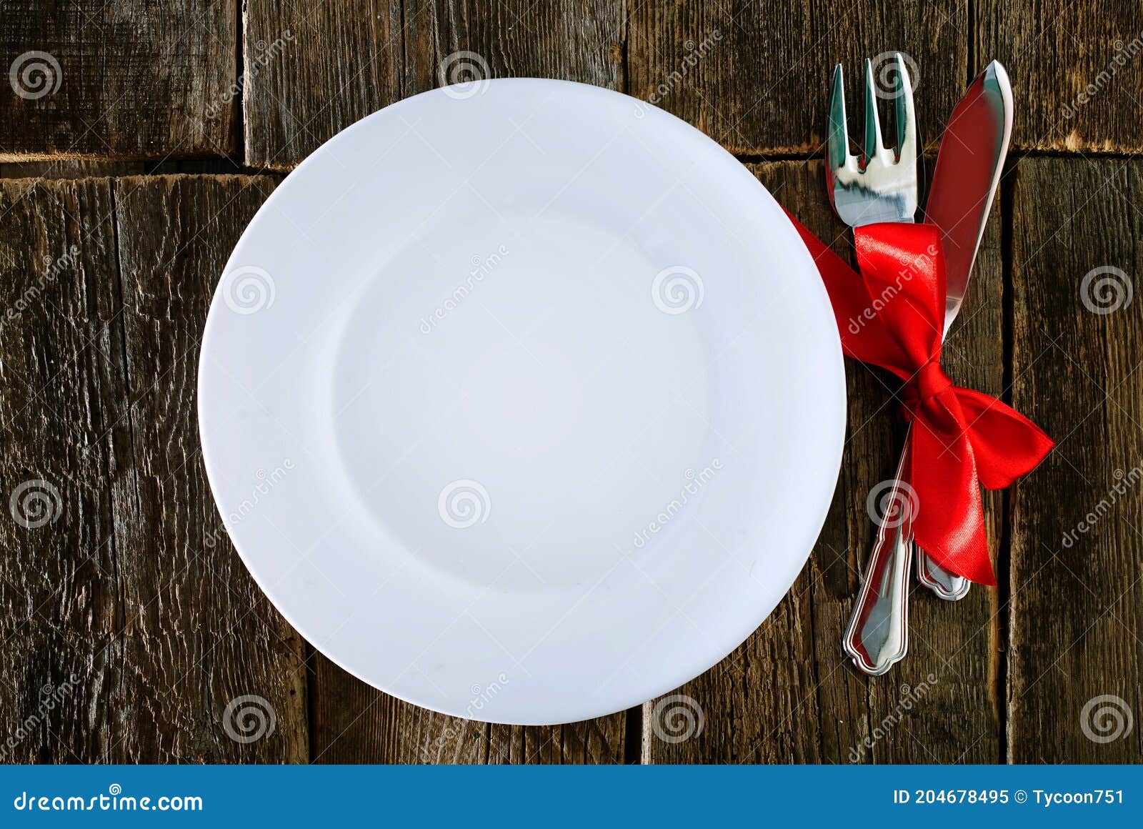 Fork and knife on a table stock image. Image of place - 204678495
