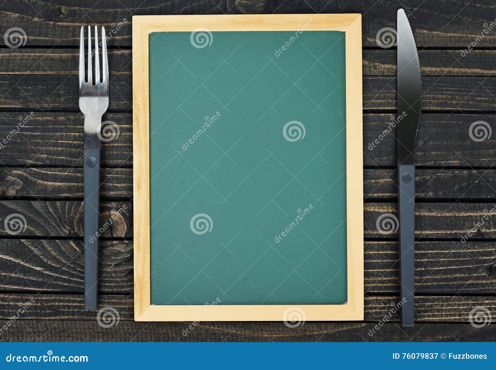 Fork and knife on table stock image. Image of dinner - 76079837