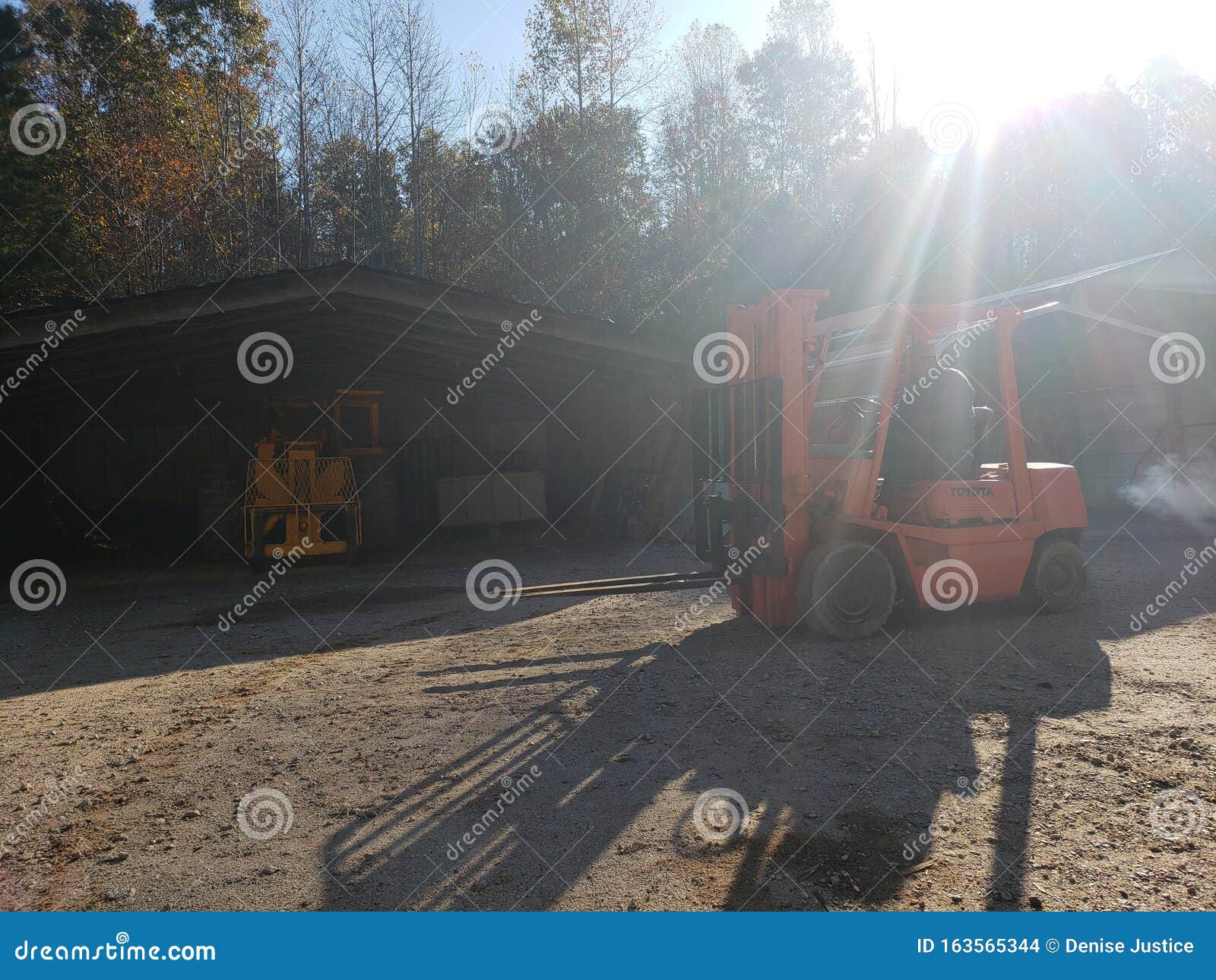 Fork Lift Coming from Under Building To Work Editorial Stock Image ...