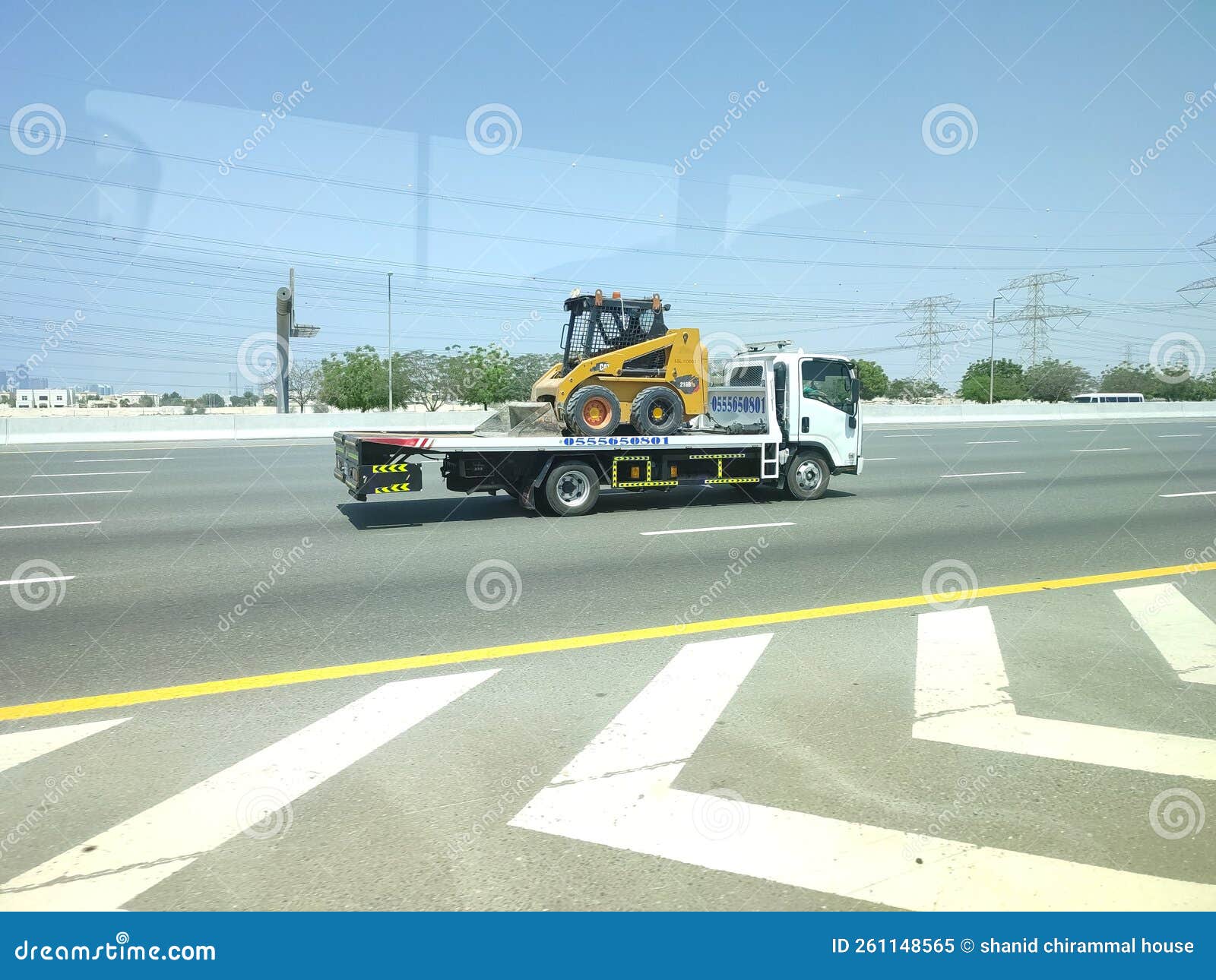 Fork Lift Machine on Top a Truck Moving on the Road Editorial Image ...