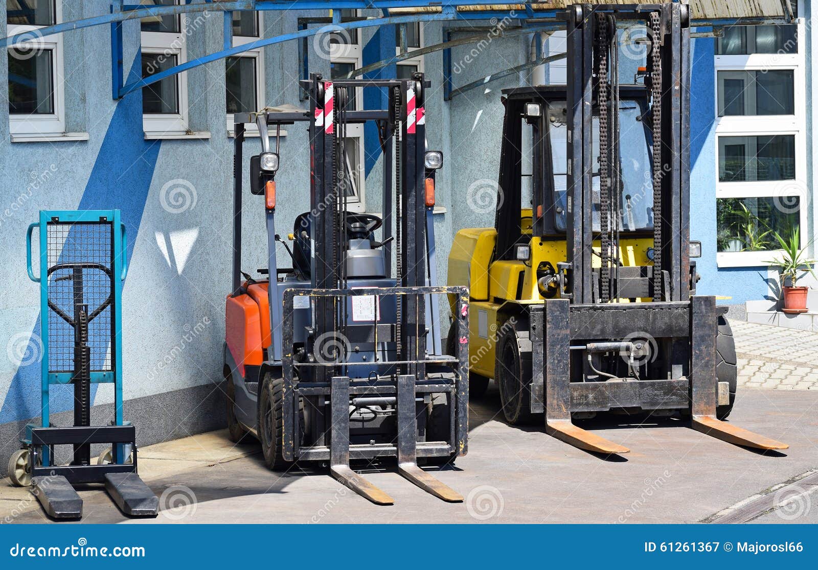 Fork lifts stock image. Image of angle, construction - 61261367