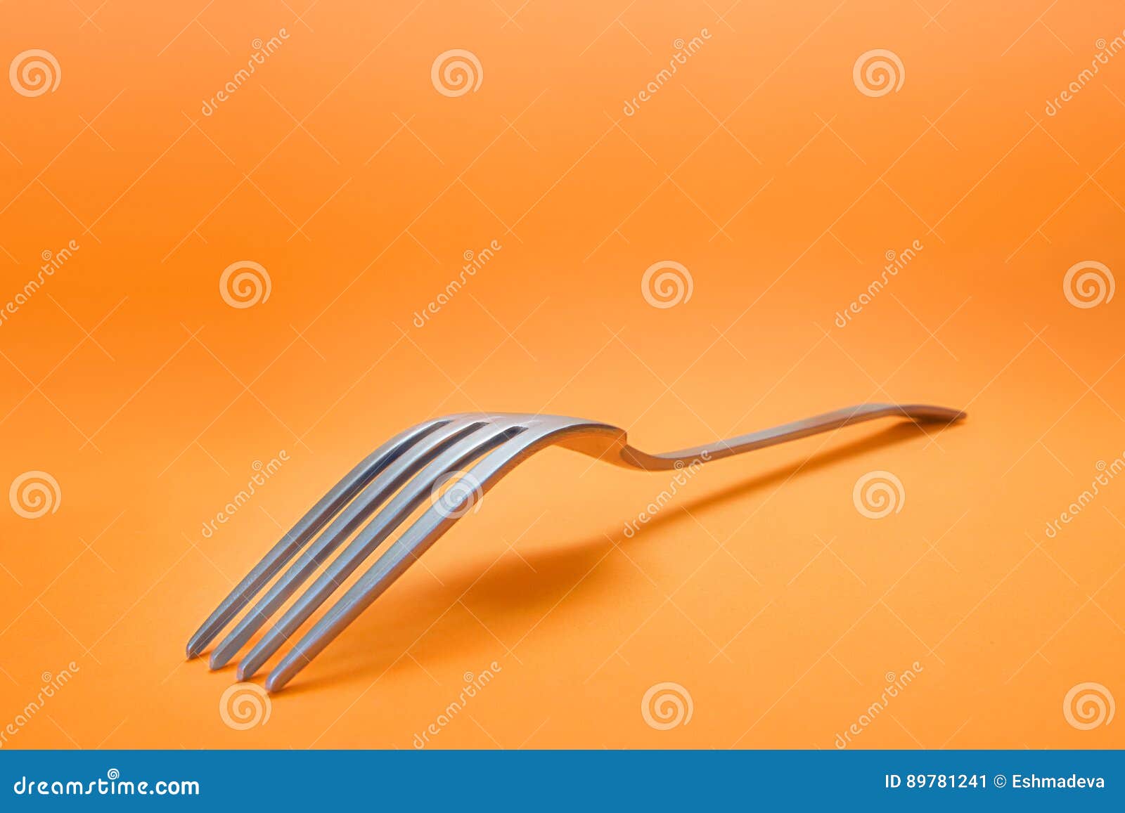 Fork on orange background stock image. Image of cutlery - 89781241