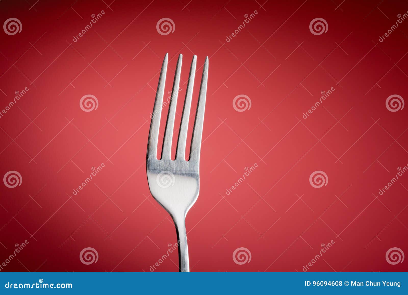 Fork in Red Background in Studio Stock Photo - Image of colored ...