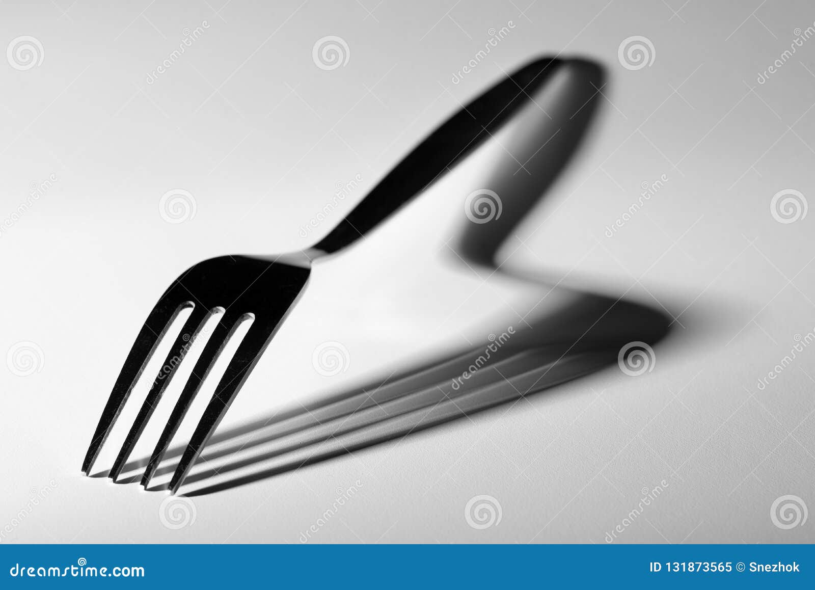 Fork and shadow stock image. Image of white, fork, macro - 131873565