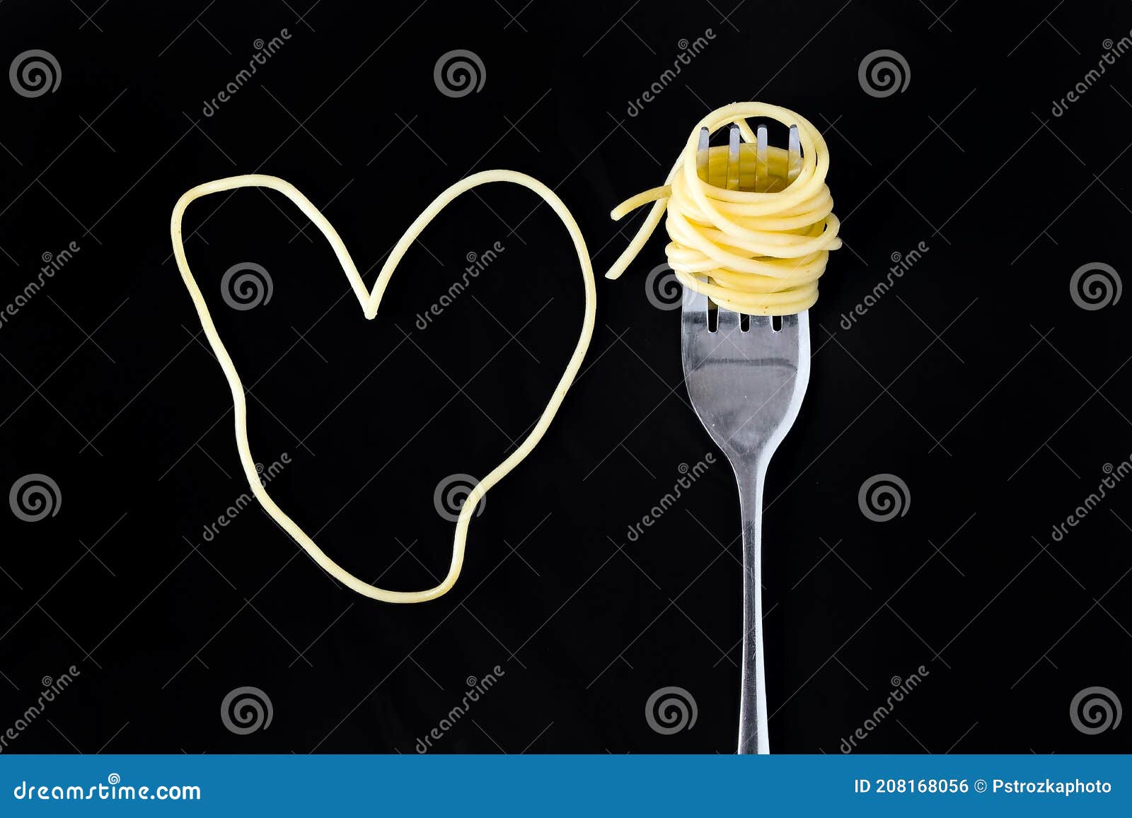 Fork with Spaghetti Pasta on Black Stock Photo - Image of green ...
