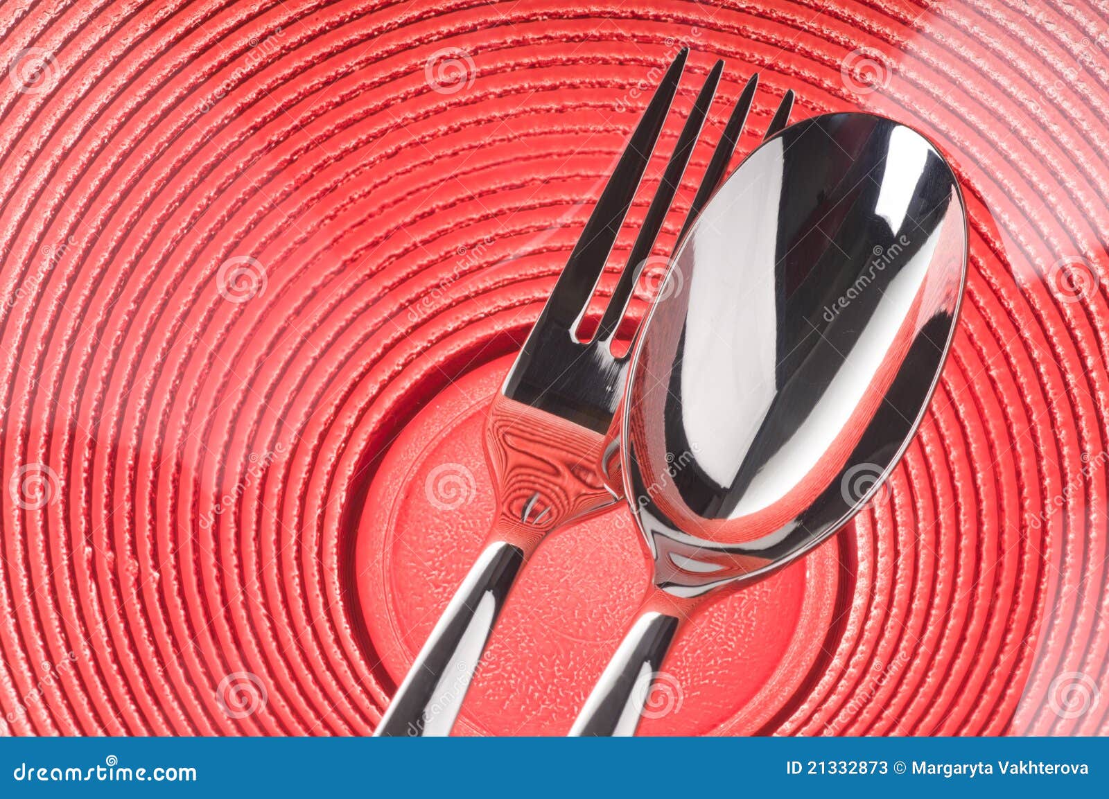 Fork and Spoon on Red Plate Stock Image - Image of utensils, equipment ...