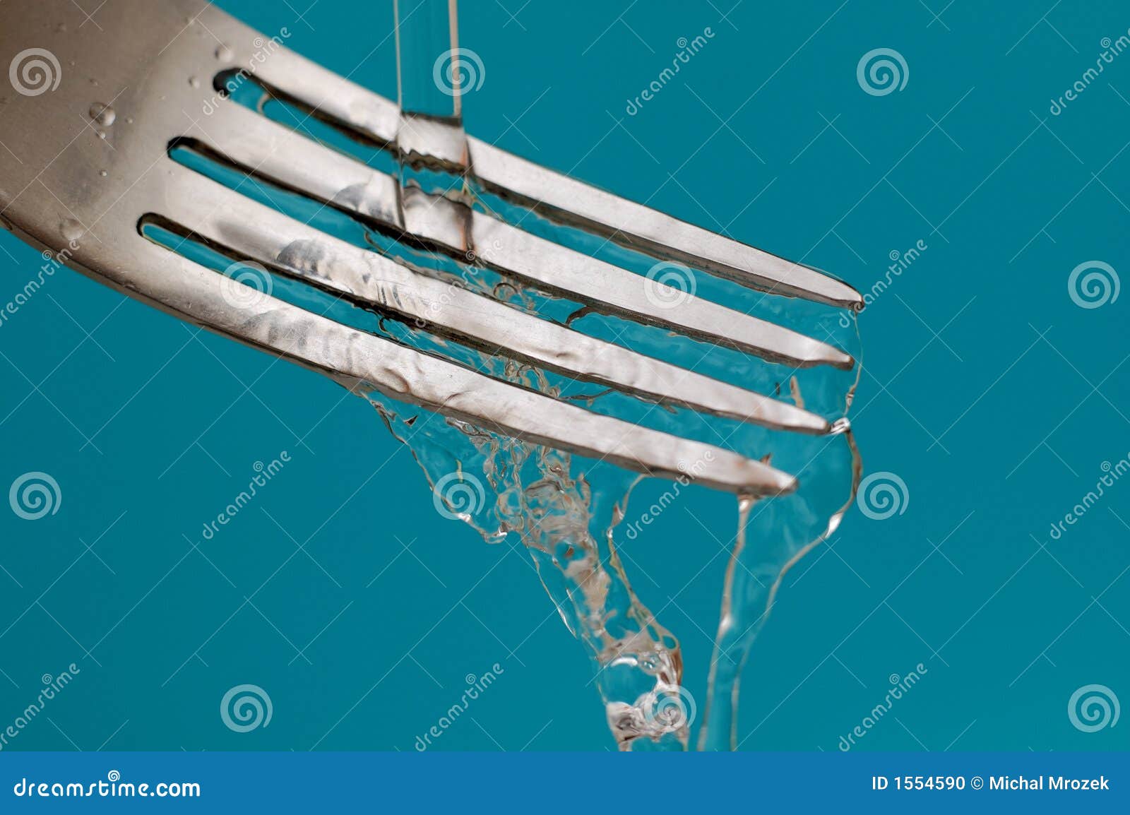 A fork and water - hygiene stock photo. Image of green - 1554590