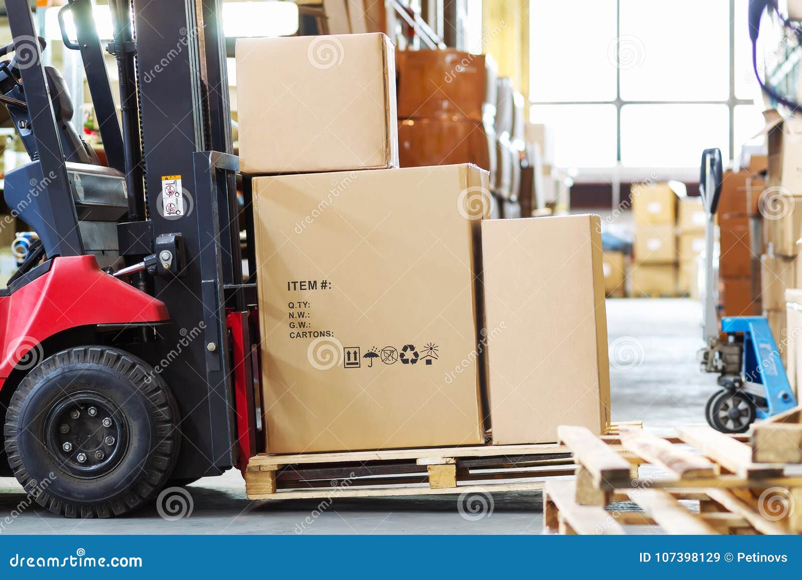 Forklif with a Three Large Cardboard Boxes in a Modern Warehous Stock ...