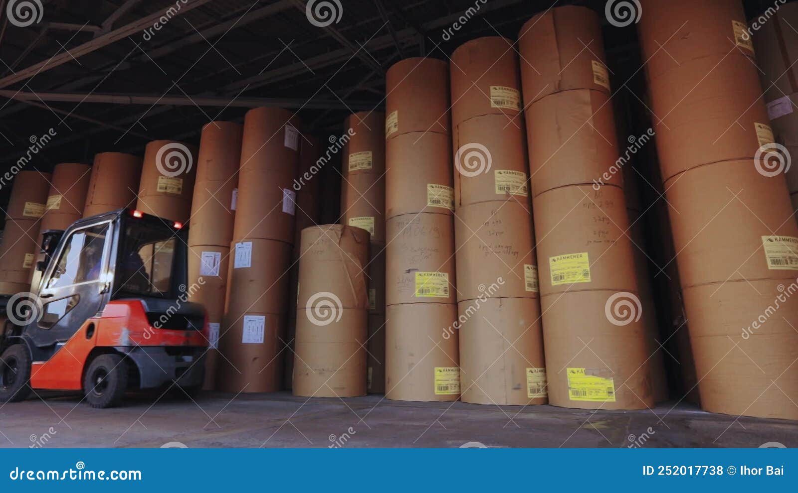 The Forklift is Carrying a Large Roll of Paper. a Forklift is Carrying ...