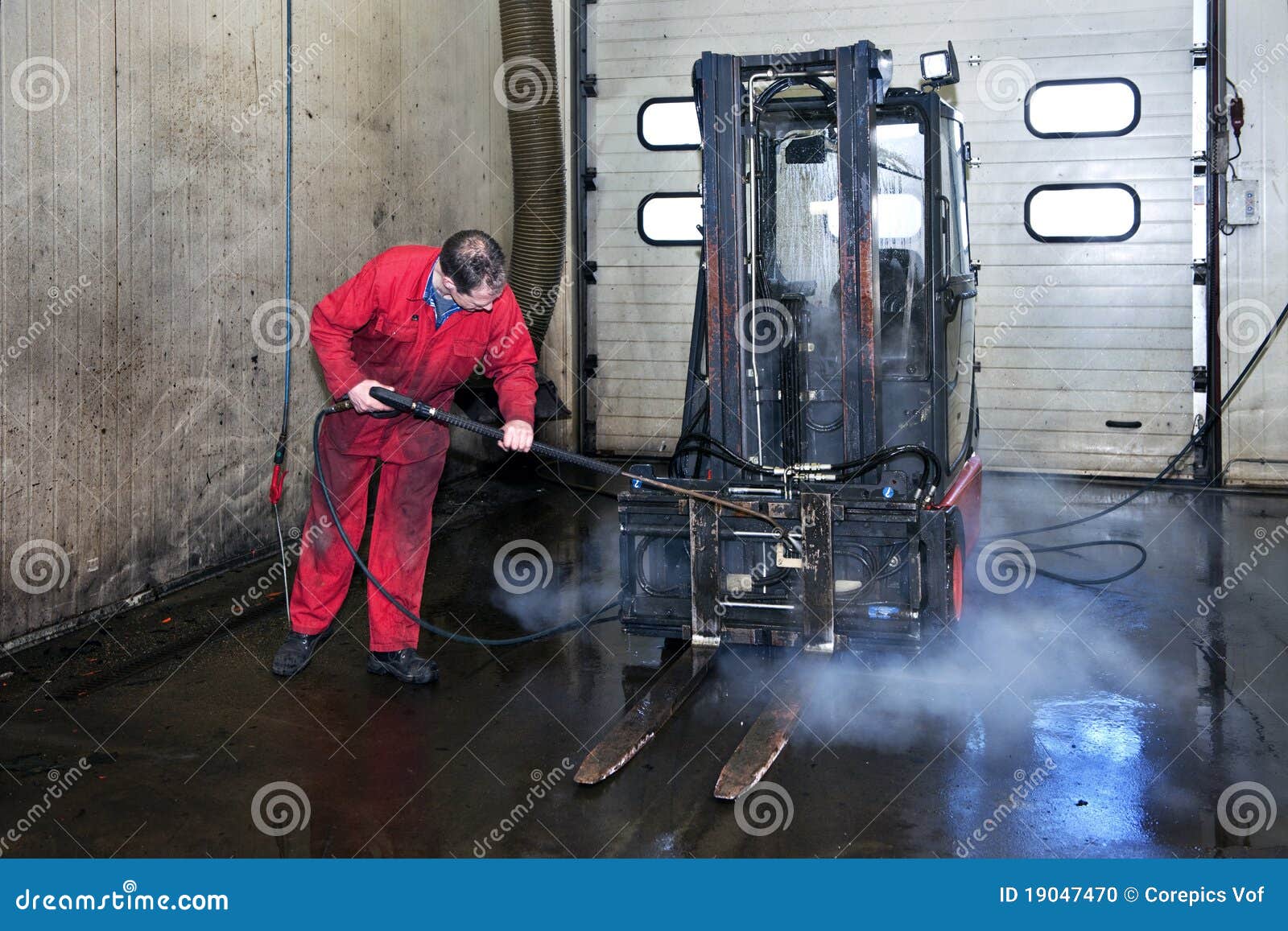 Forklift cleaning stock photo. Image of hosing, spraying - 19047470