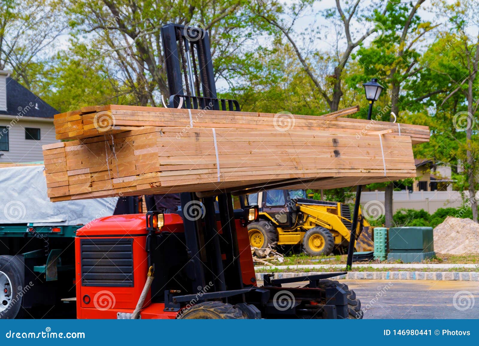 Forklift on a Construction Preparing To Construction Building Material ...