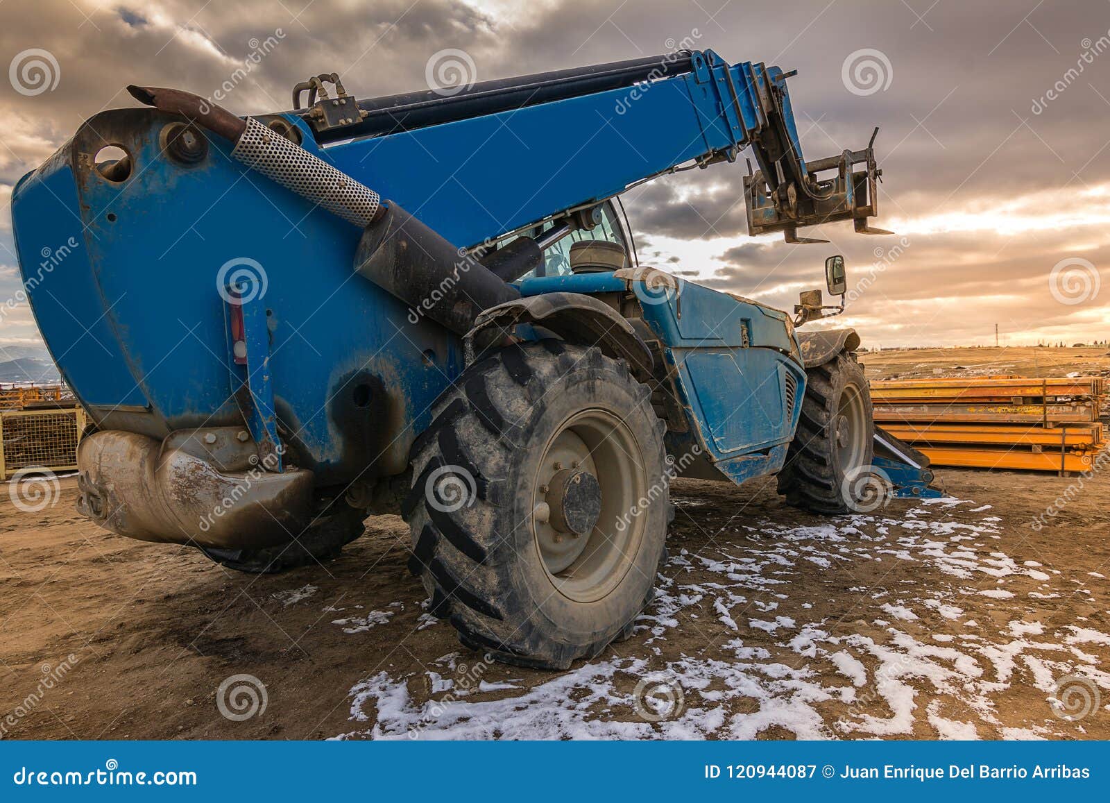 Forklift on a Construction Site, Preparing To Raise Construction Parts ...