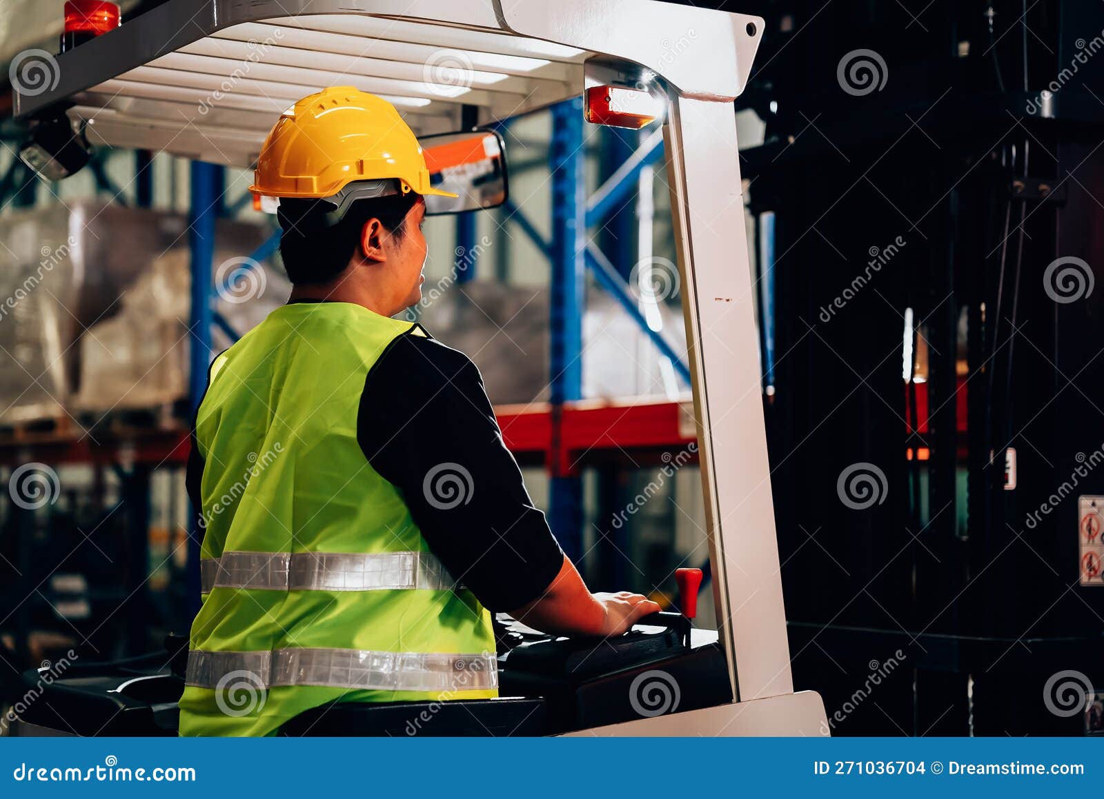 Professional Warehouse Worker Driver Moving Cardboard Boxes Stock Photo ...