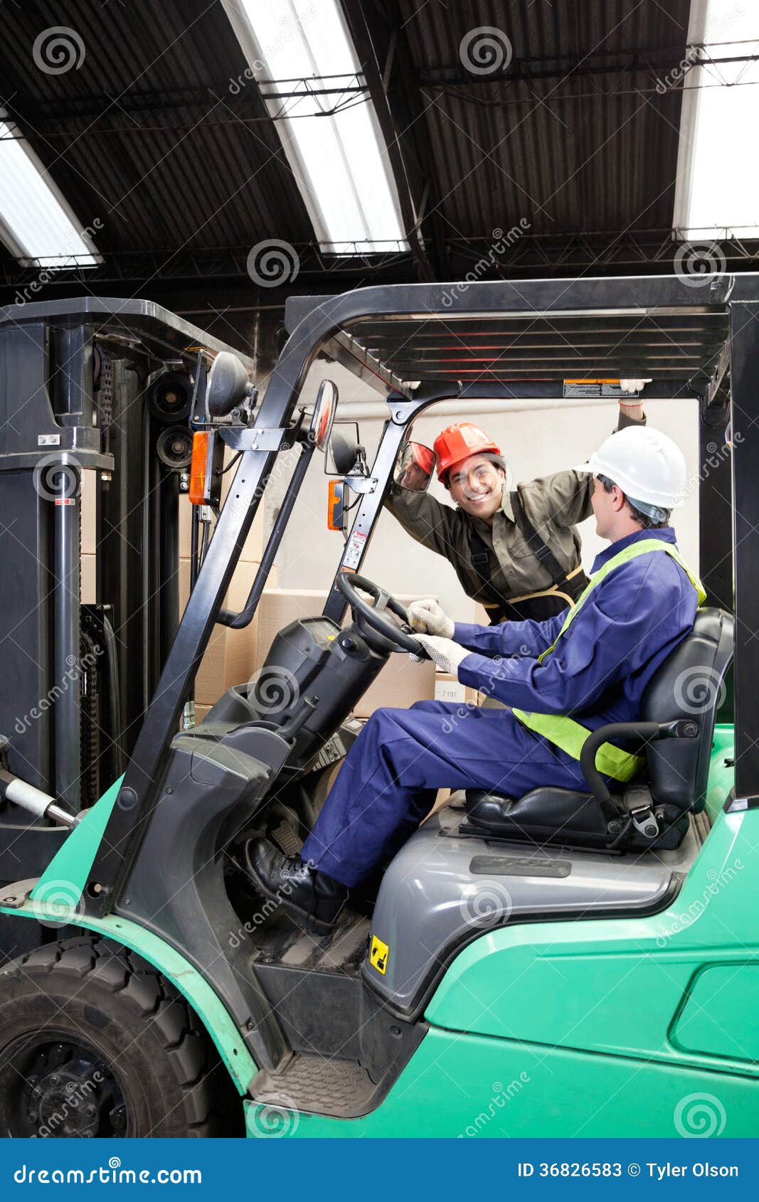 Forklift Driver Communicating with Colleague Stock Image - Image of ...