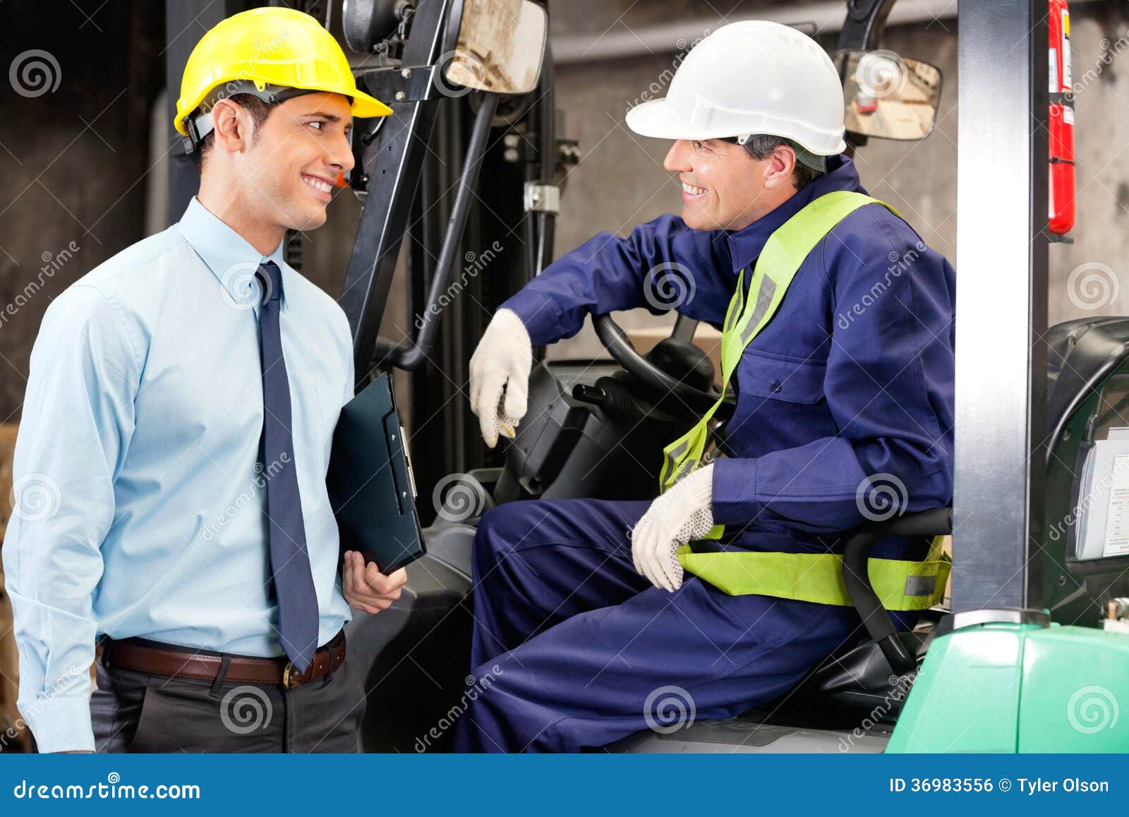 Forklift Driver Communicating with Supervisor Stock Photo - Image of ...