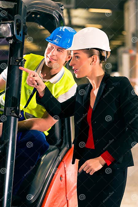 Forklift Driver and Supervisor at Warehouse Stock Image - Image of ...