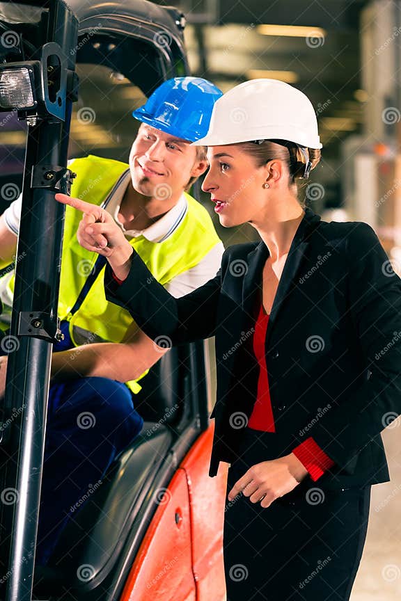 Forklift Driver and Supervisor at Warehouse Stock Image - Image of ...