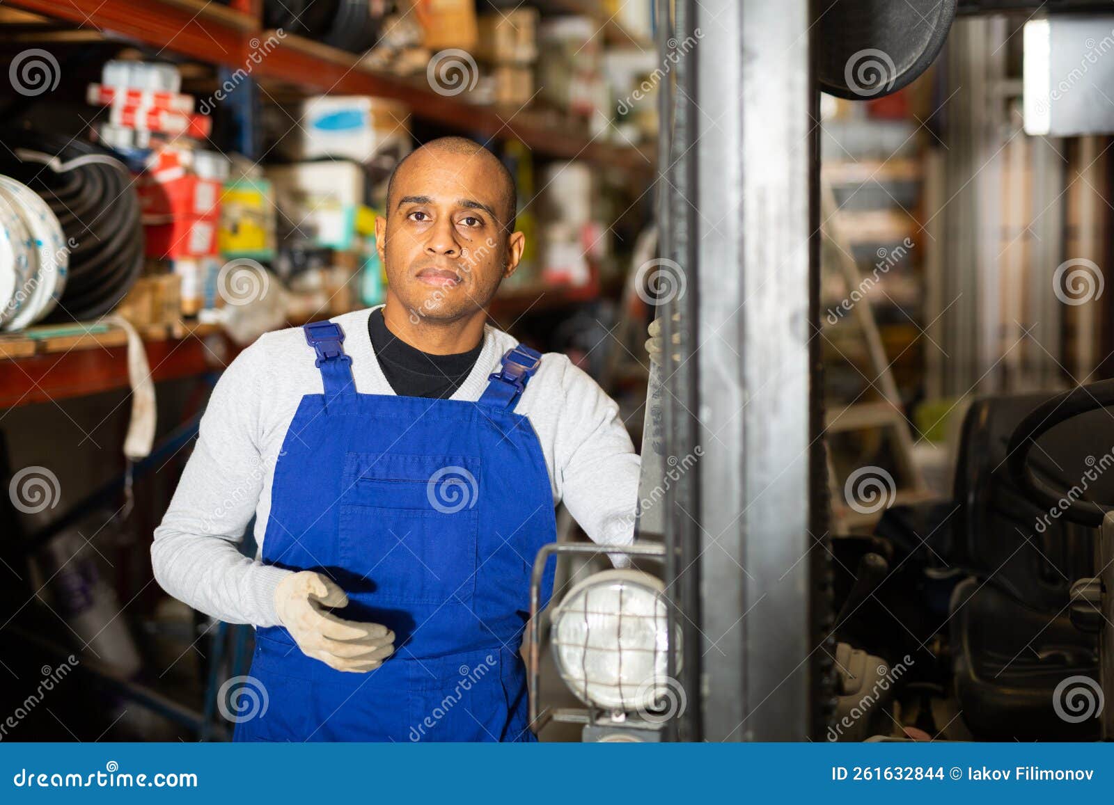 Forklift Driver at the Warehouse of Hardware Store Stock Photo - Image ...