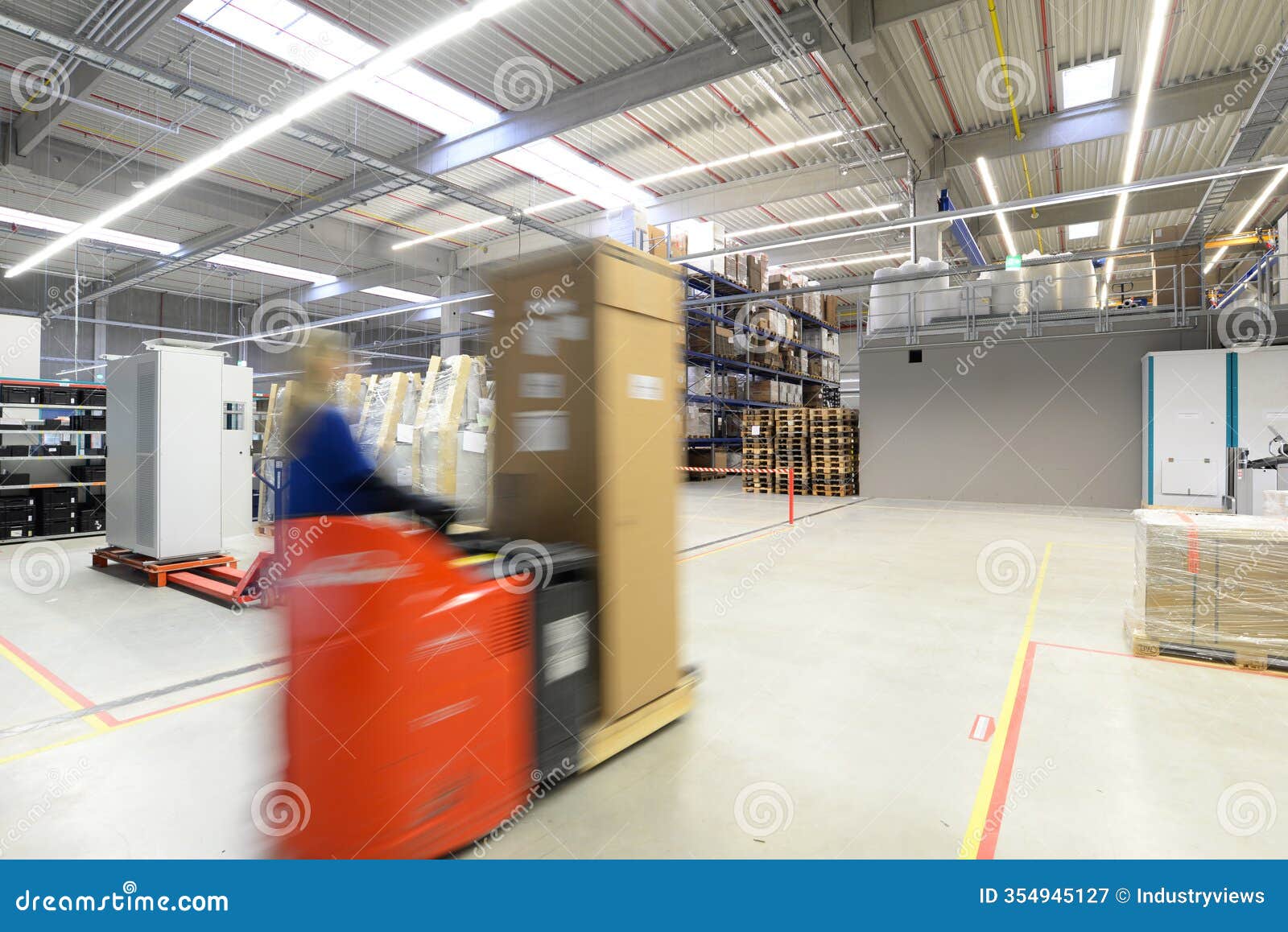 Forklift Driver in a Warehouse for Industrial Goods Stock Image - Image ...