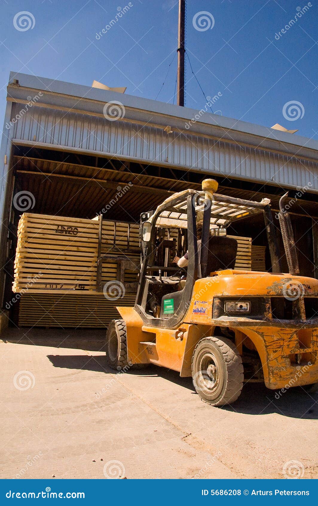 Forklift handling timber 2 stock photo. Image of device - 5686208