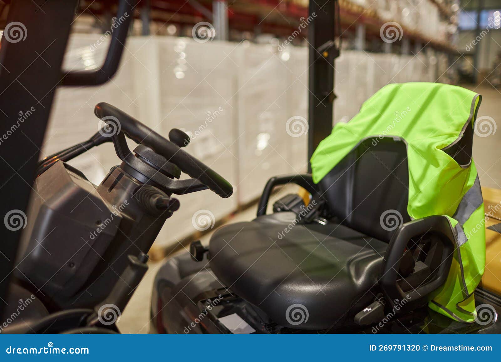 Forklift Interior with Reflective Jacket on Empty Drivers Seat Stock ...