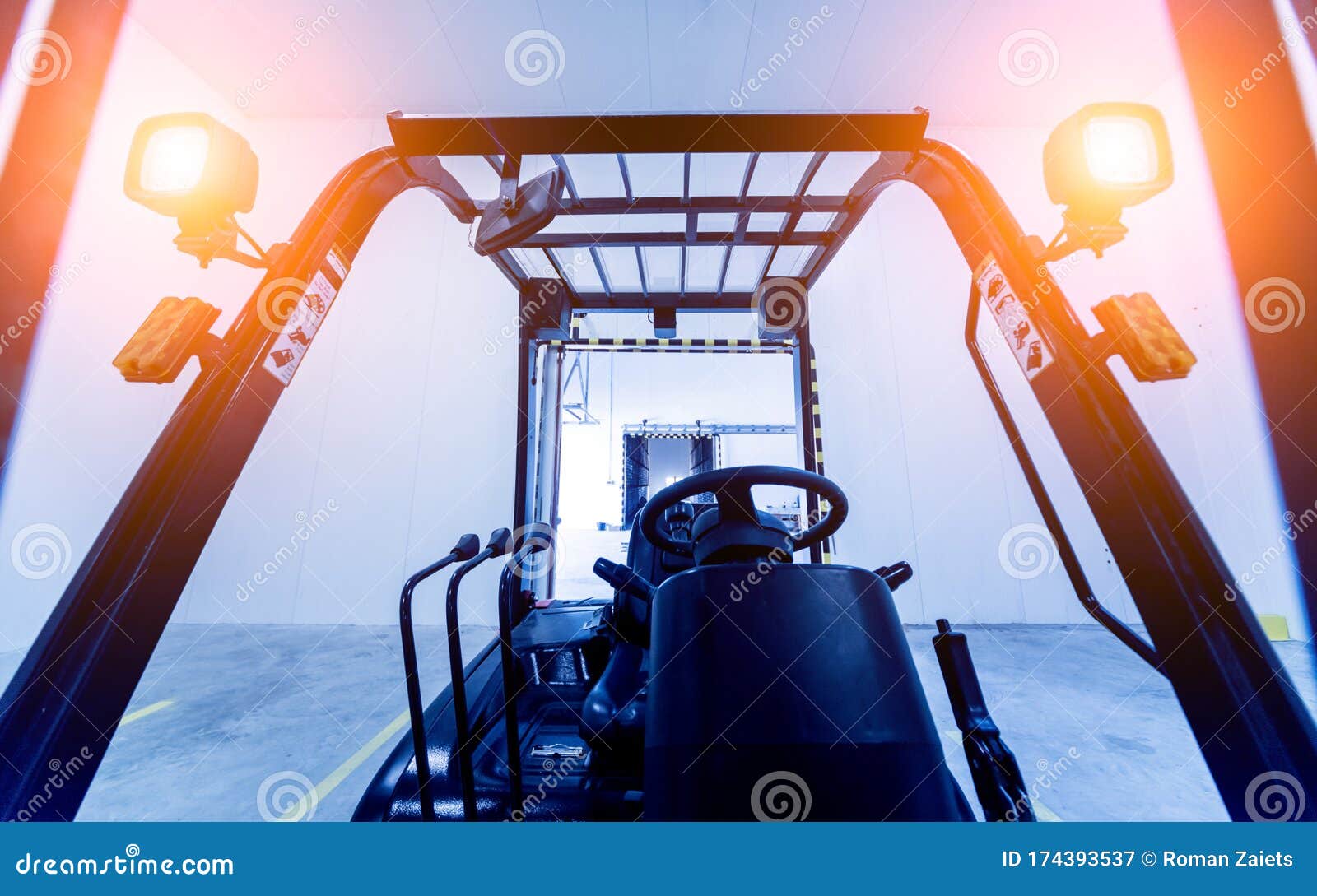 Forklift in a Large Industrial Freezer Warehouse. Empty Warehouse Stock ...