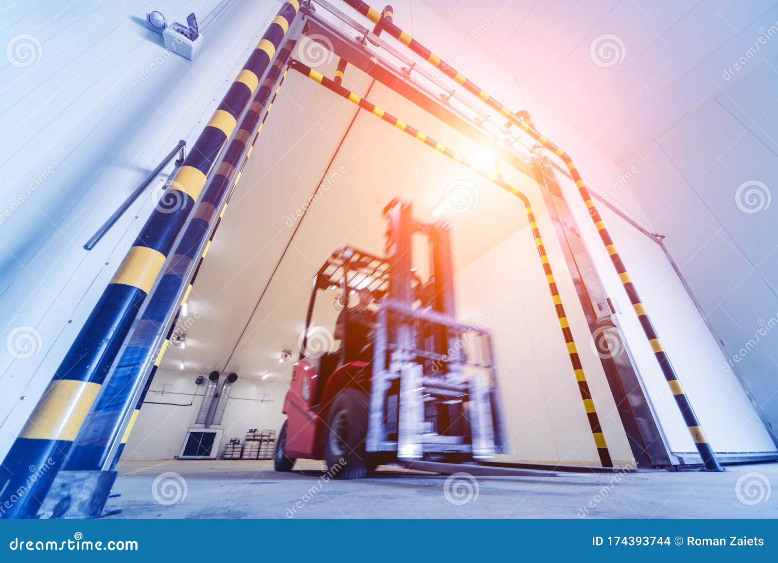 Forklift in a Large Industrial Freezer Warehouse. Empty Warehouse Stock ...