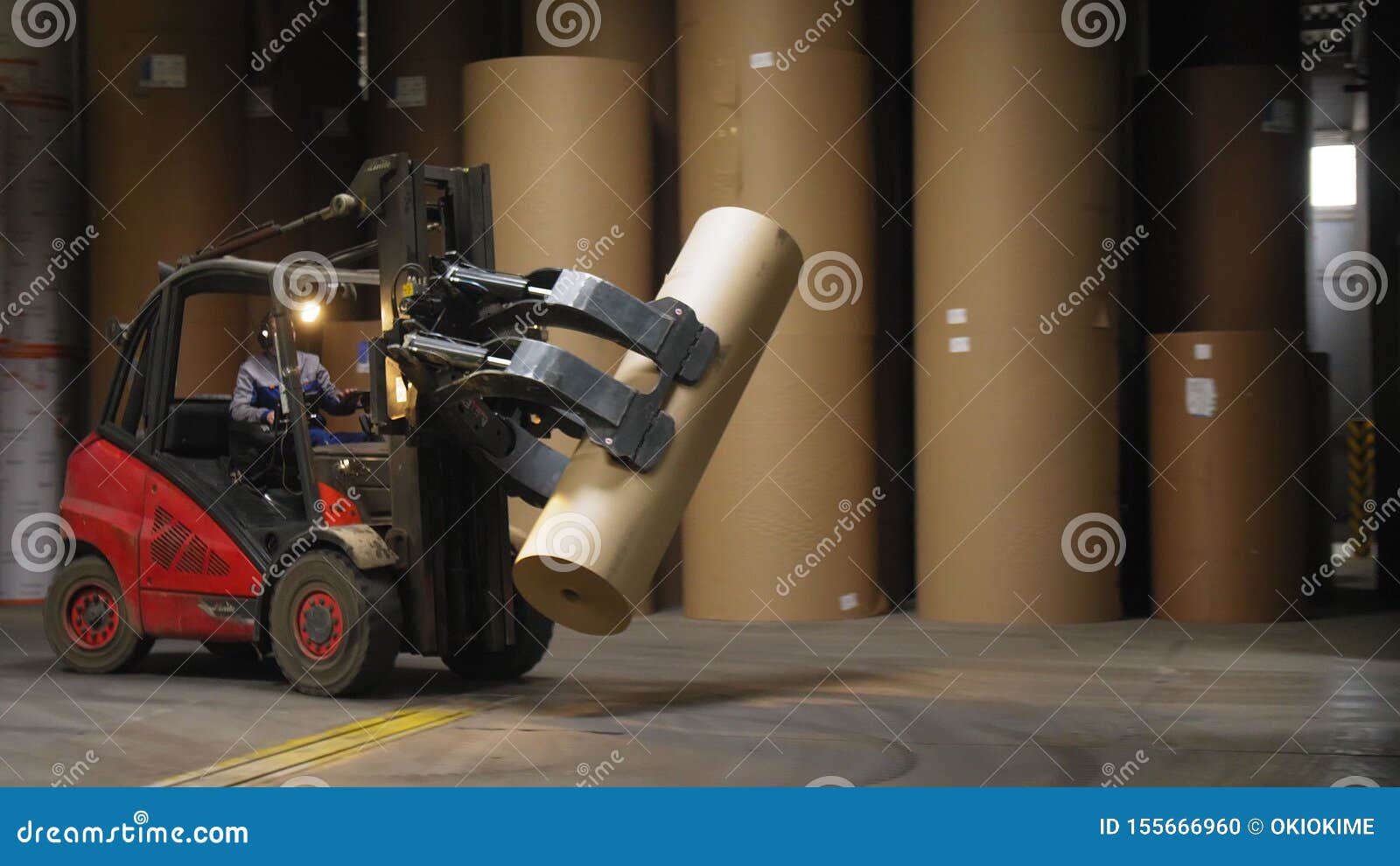 Forklift Loader Carries Packaging Paper in Plant Warehouse Stock ...