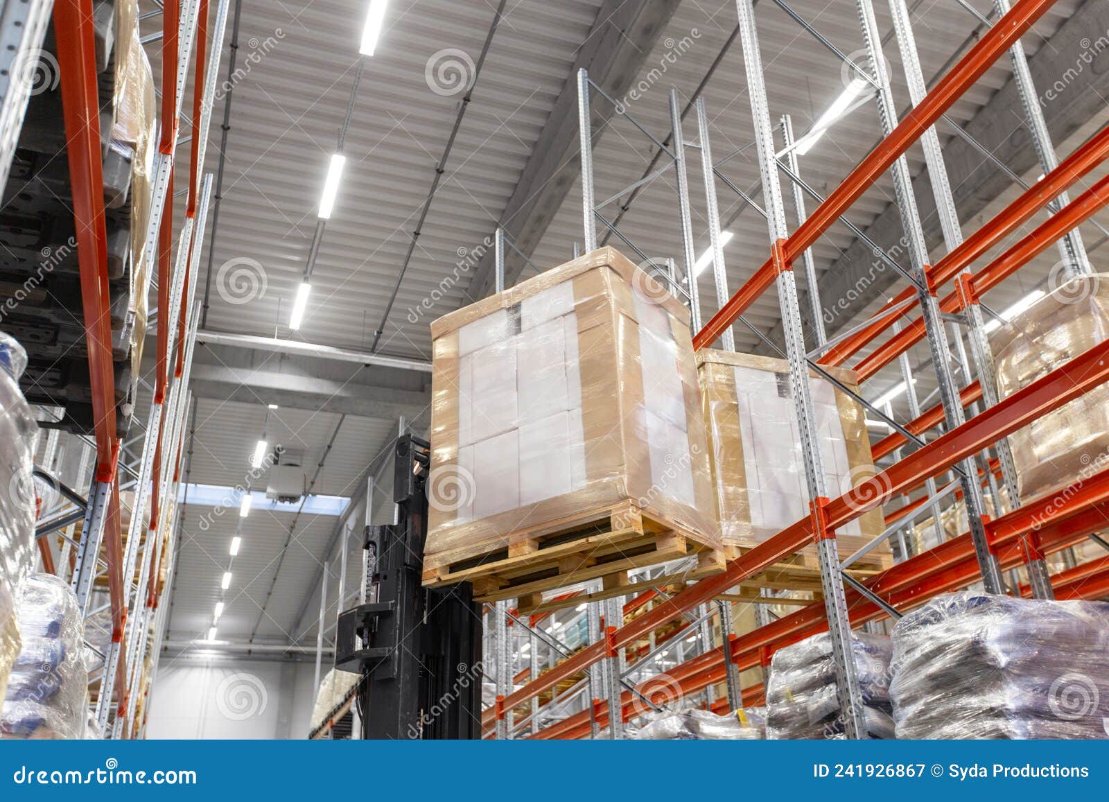 Forklift Loader Loading Cargo To Warehouse Shelves Stock Image - Image ...
