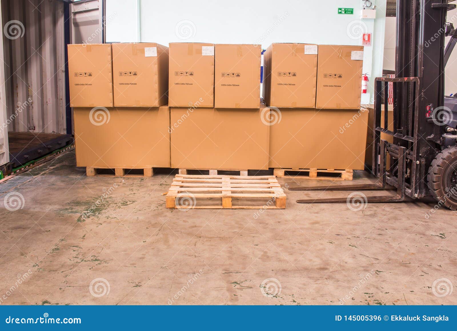 The Forklift Loading Pallet with a Forklift into a Truck Stock Photo ...